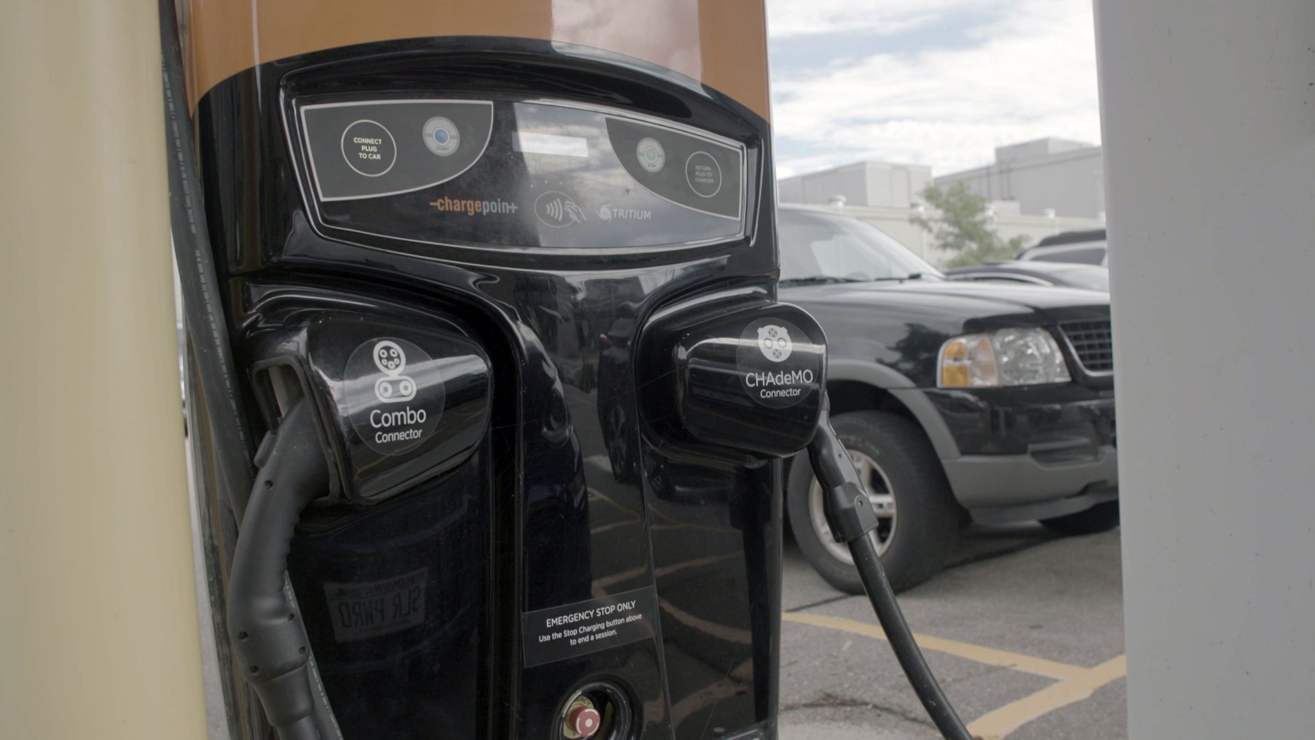 Evers signs bills to support an EV charging station network across Wisconsin